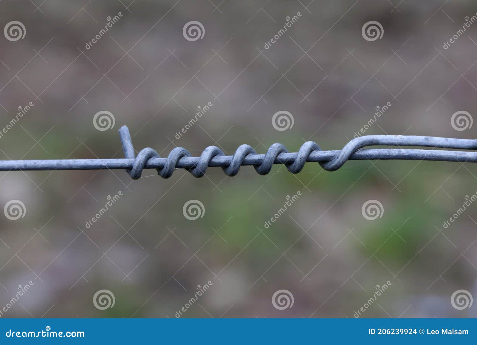 Twisting of Metal Wire on an Electric Fence Stock Photo - Image of ...