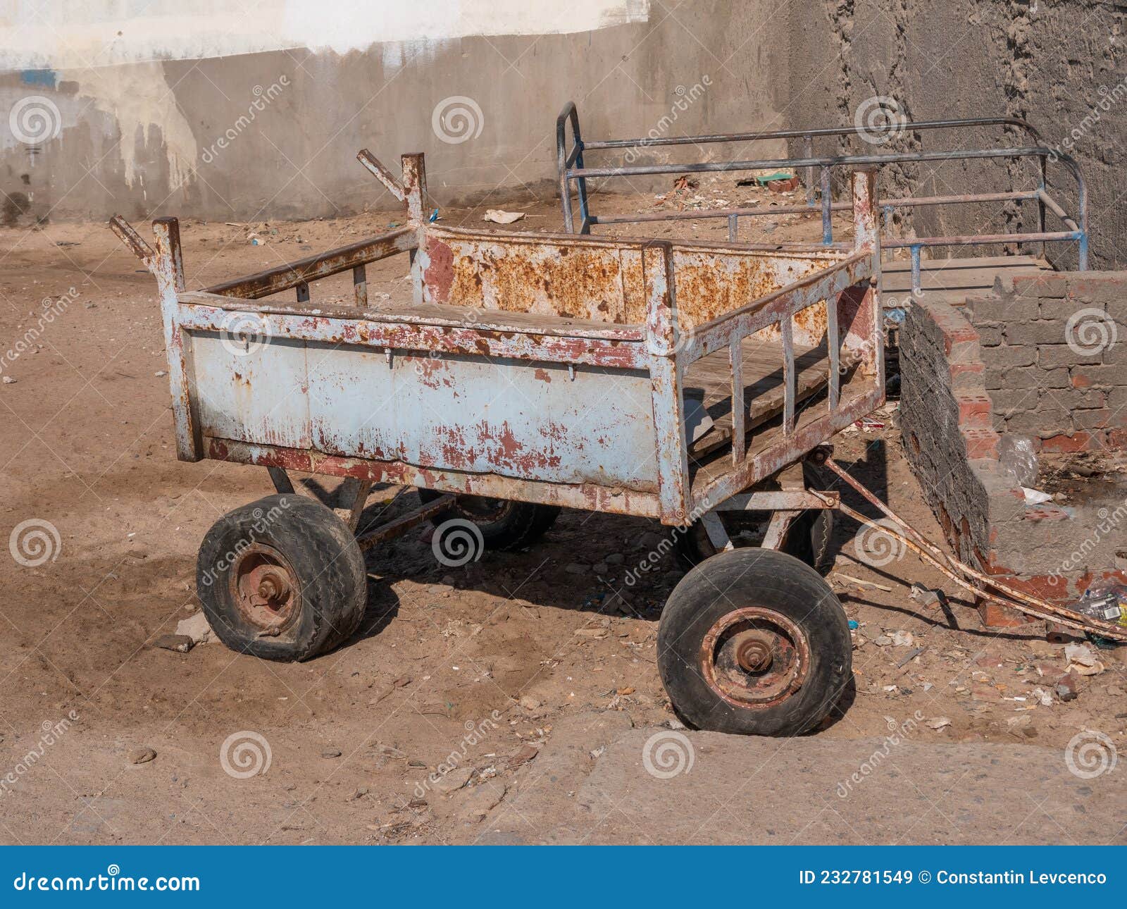 Two Old Rusty Iron Carts. the Carts are Weathered and Old Stock Image ...