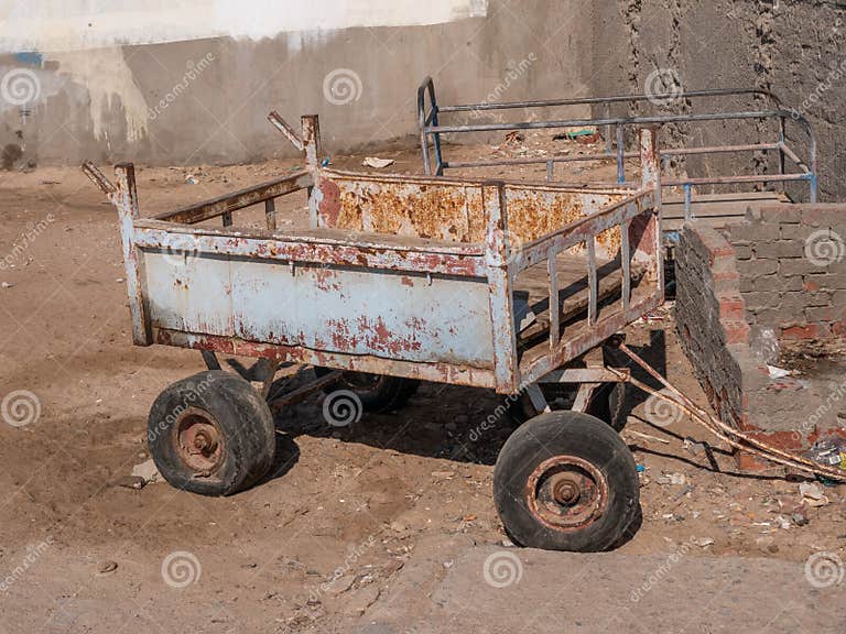 Two Old Rusty Iron Carts. the Carts are Weathered and Old Stock Image ...