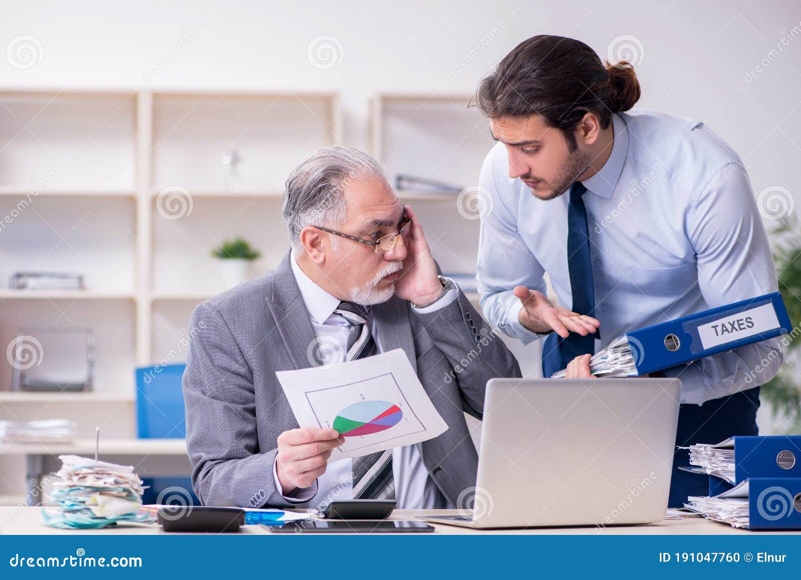Two Accountants Working in the Office Stock Photo - Image of graph ...