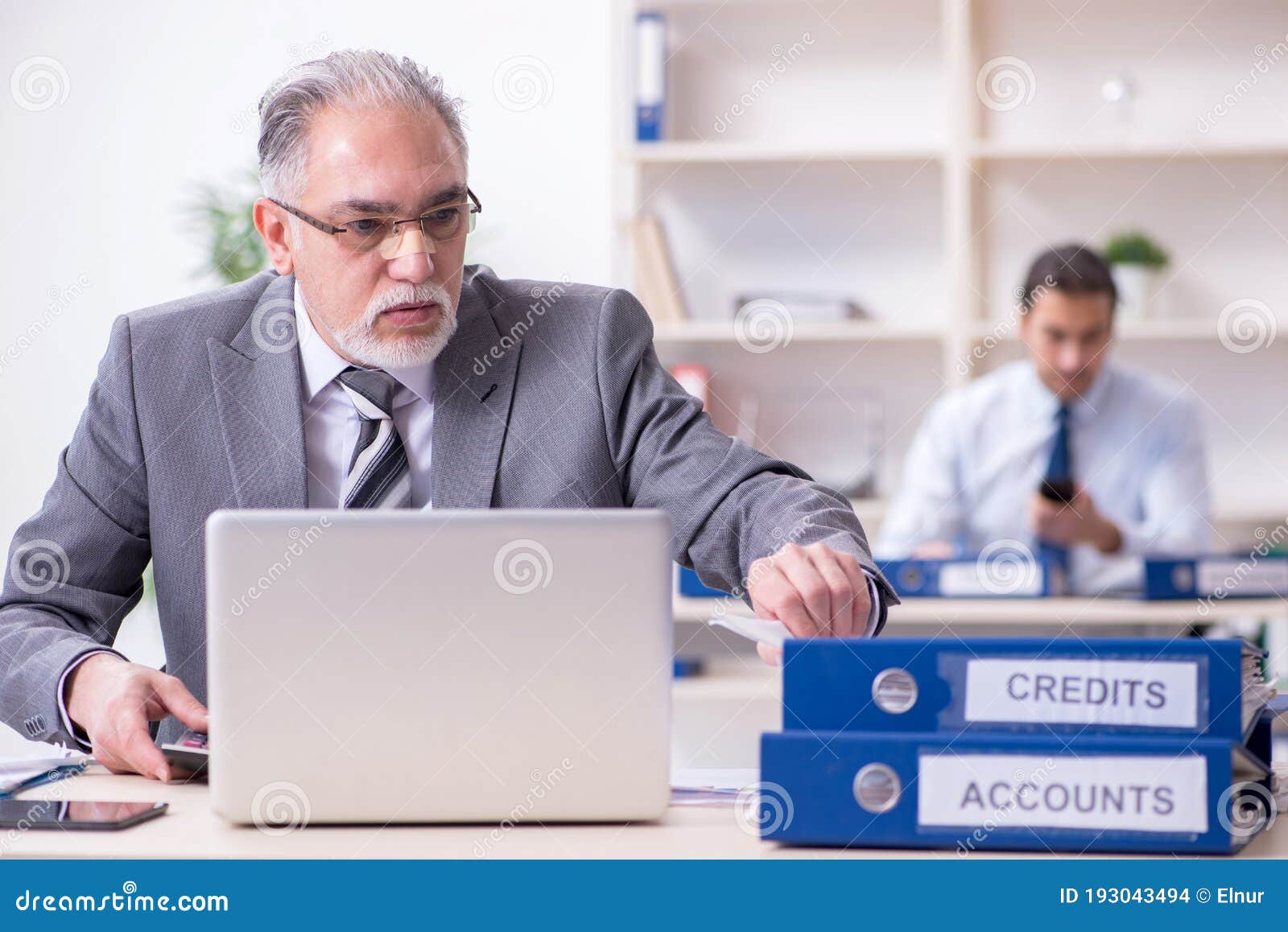 Two Accountants Working in the Office Stock Photo - Image of laptop ...