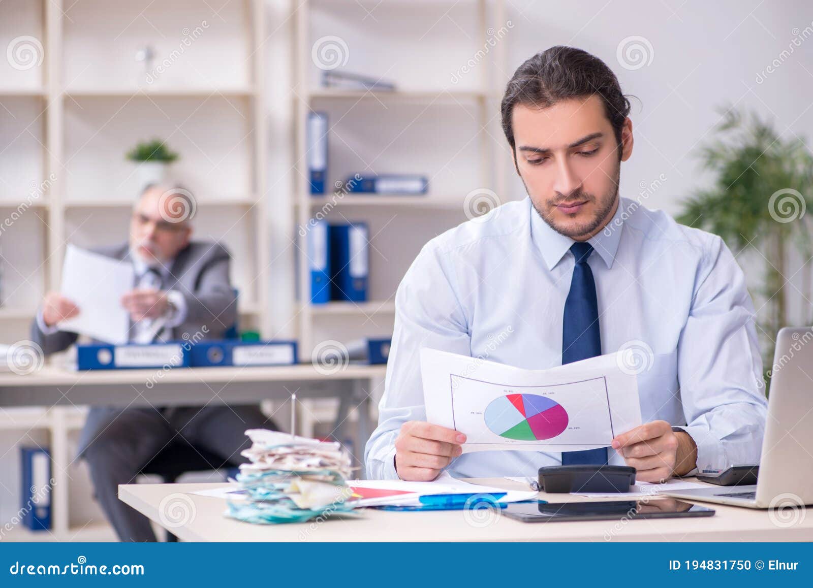 Two Accountants Working in the Office Stock Photo - Image of paperwork ...