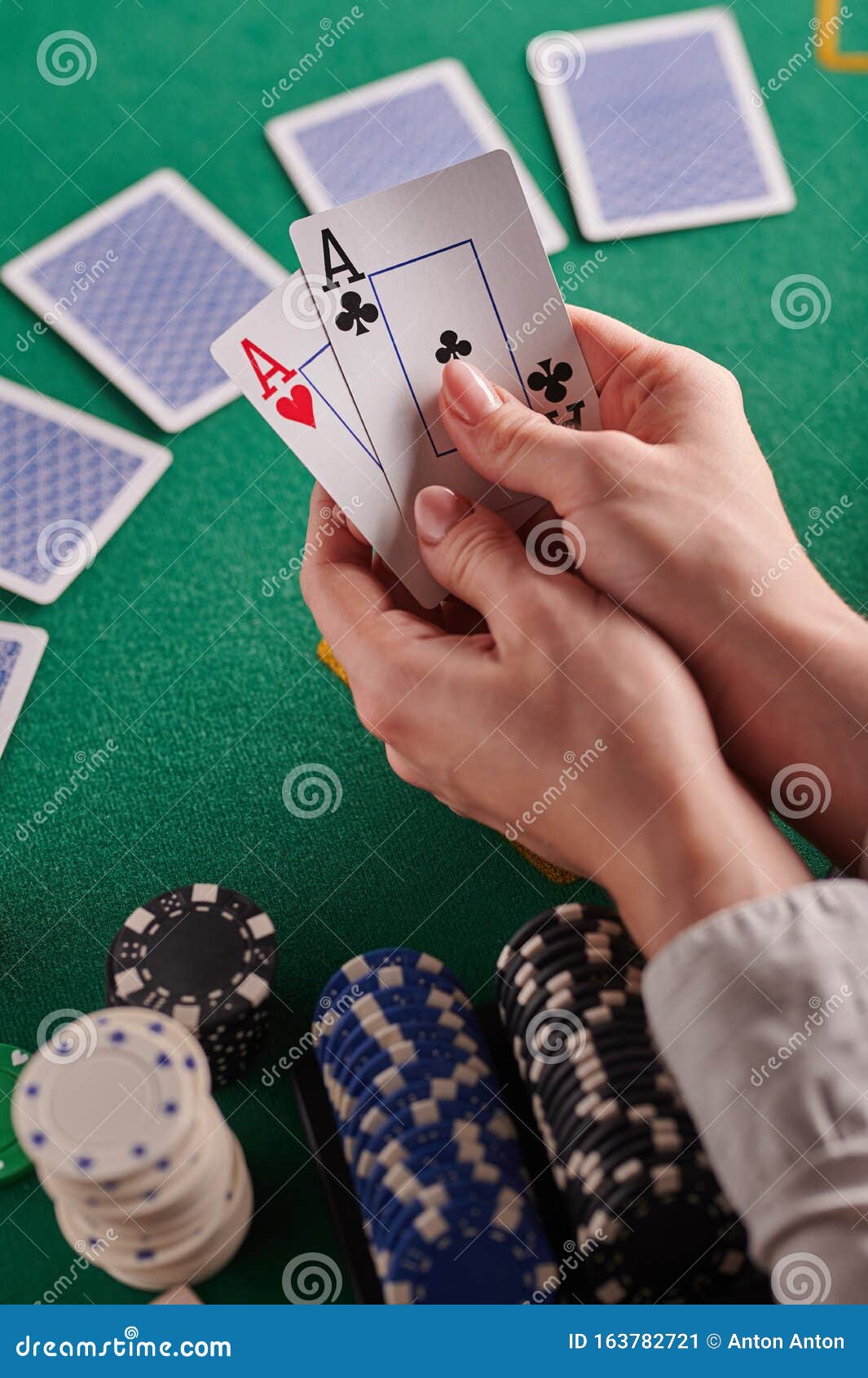 Two Aces in a Playerâ€™s Hands on the Background of a Poker Table and ...