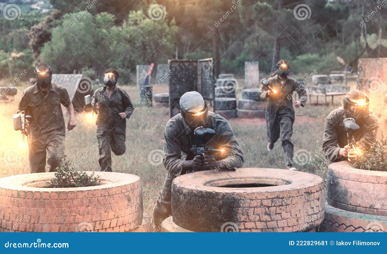 Two Active Opposing Teams with Guns Playing Paintball Stock Image ... Two Active Opposing Teams with Guns Playing Paintball Stock Image ...