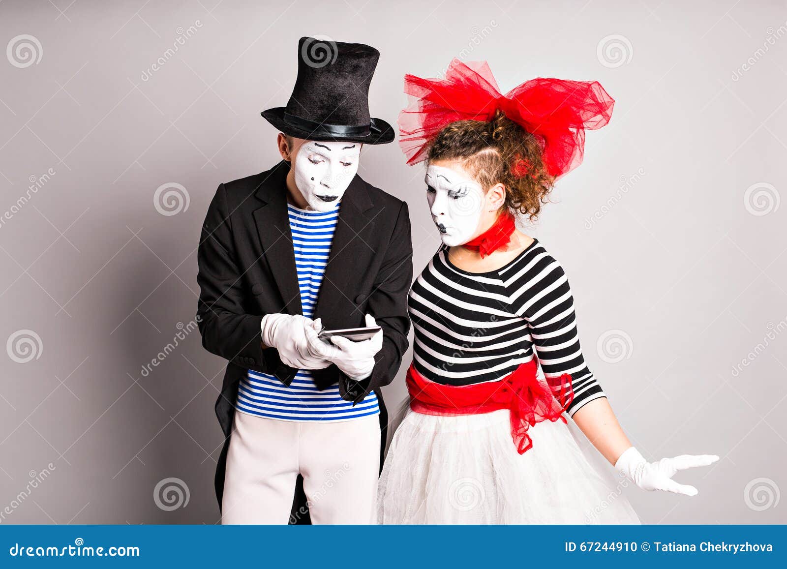 Two Actors Using Digital Tablet Over White Background. Horizontal Shot ...