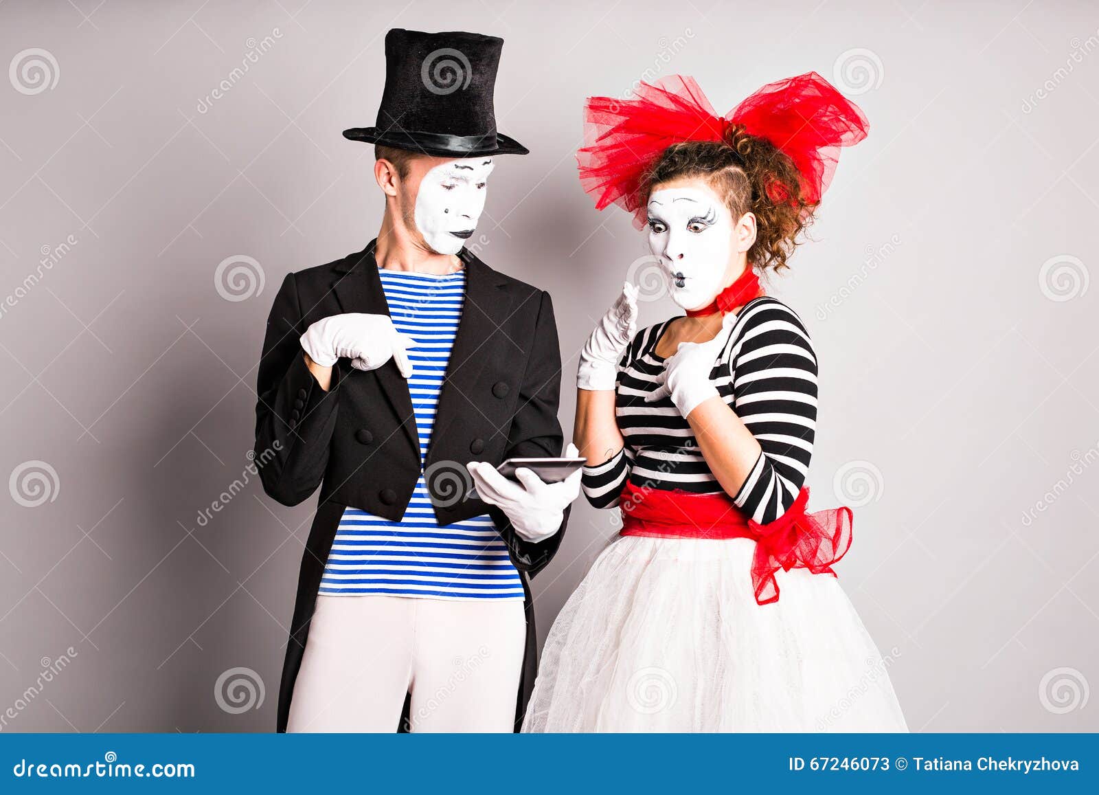 Two Actors Using Digital Tablet Over White Background. Horizontal Shot ...