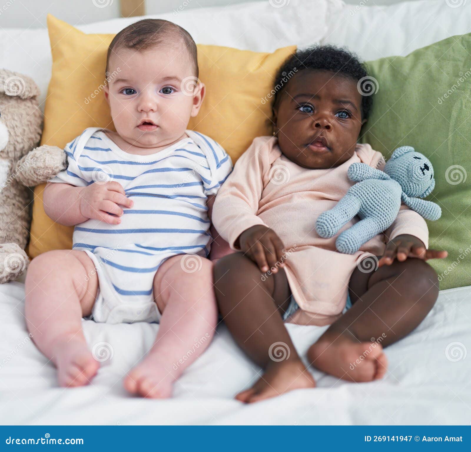 Two Adorable Babies Sitting on Bed at Bedroom Stock Image - Image of ...