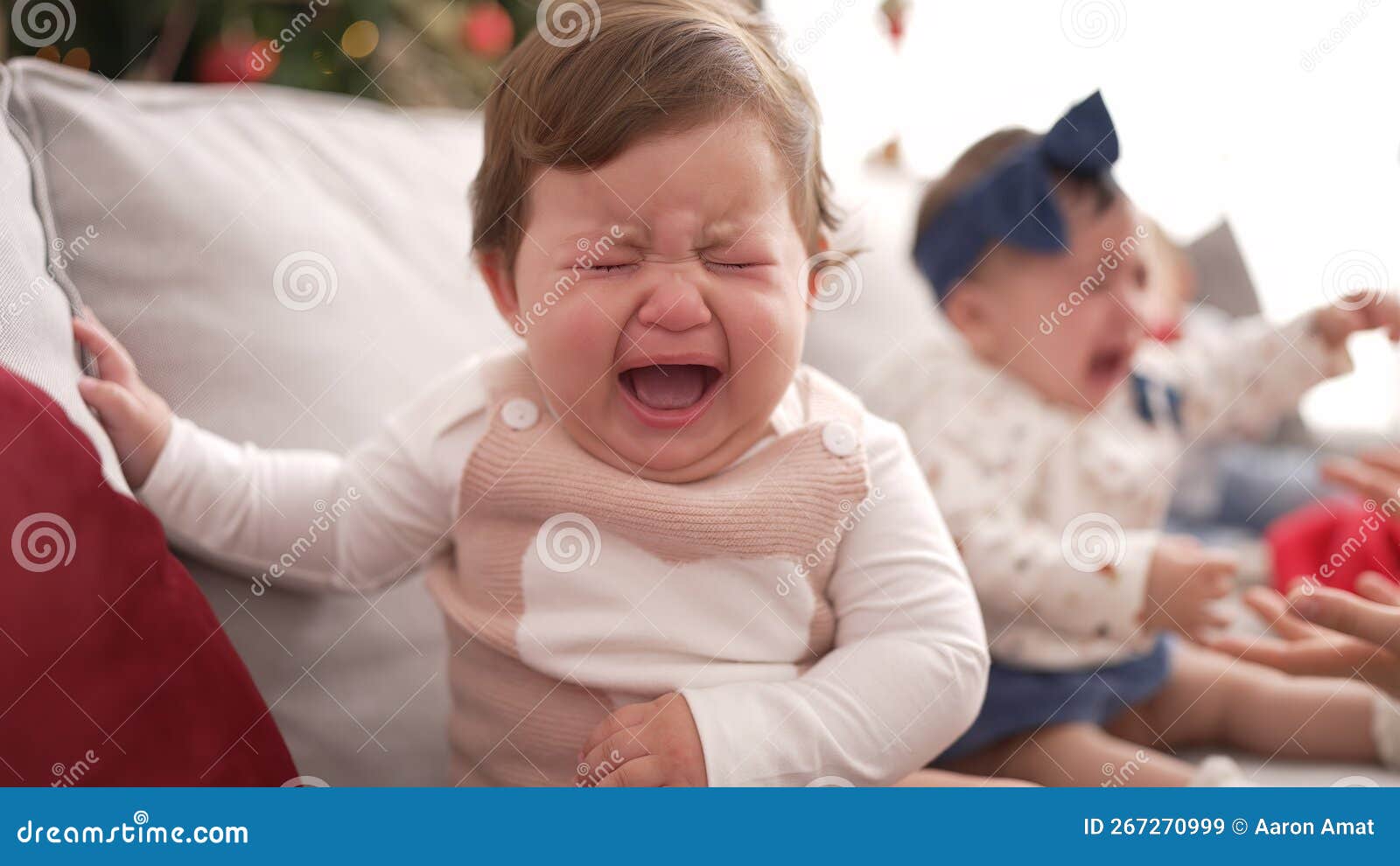 Two Adorable Toddlers Sitting on Sofa Crying at Home Stock Image ...
