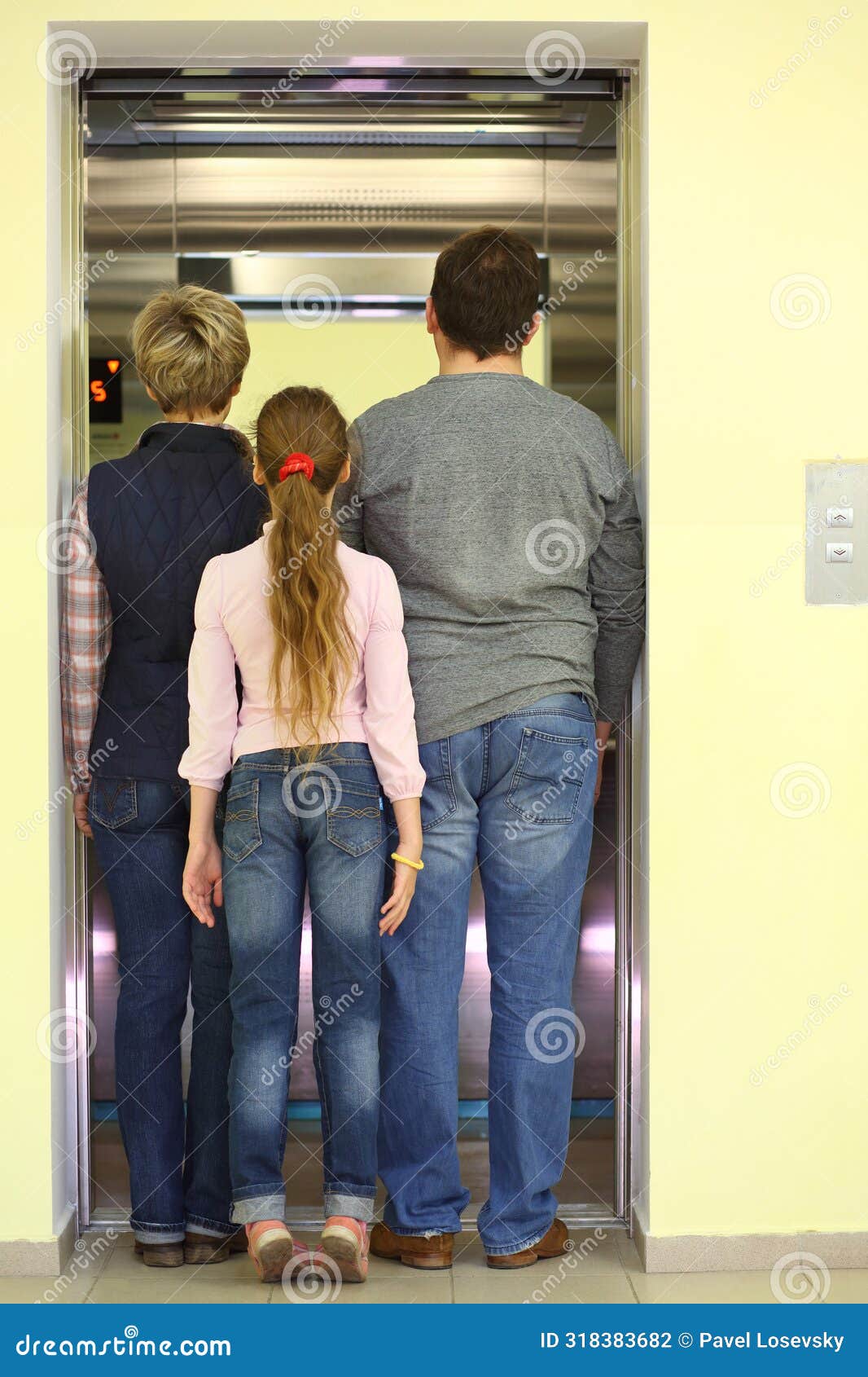 Two Adults and Girl in Front of an Opened Stock Photo - Image of mother ...