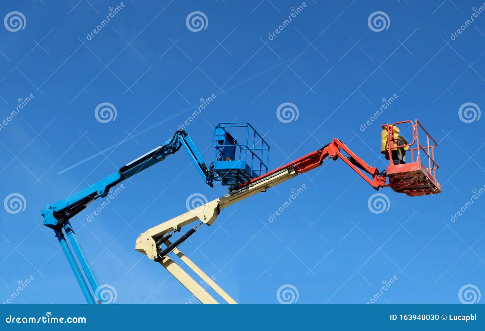 An Aerial Work Platform And A Mobile Crane Install A Prefabricated ...