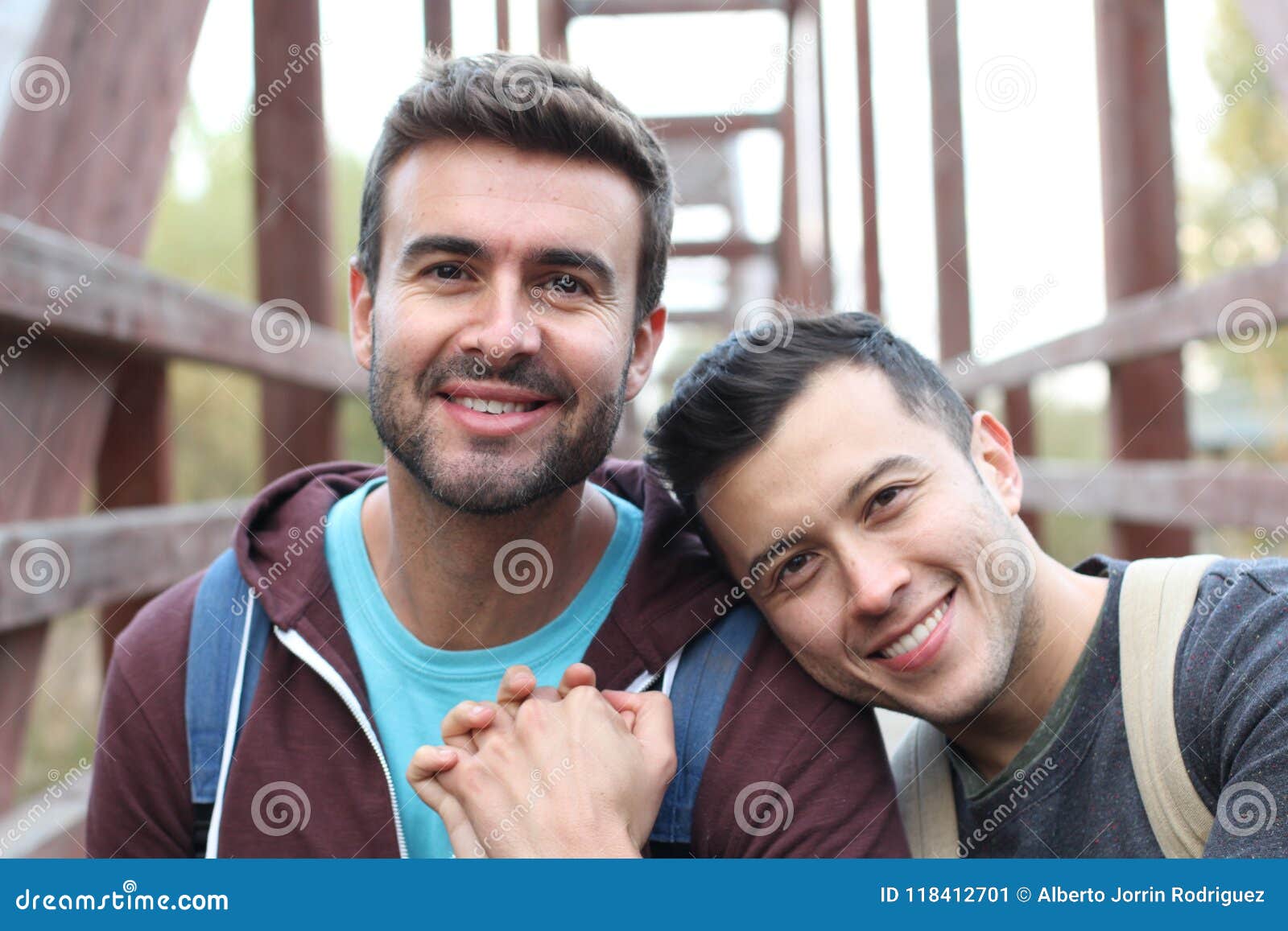 Two Affectionate Men Holding Hands Stock Image - Image of happiness ...