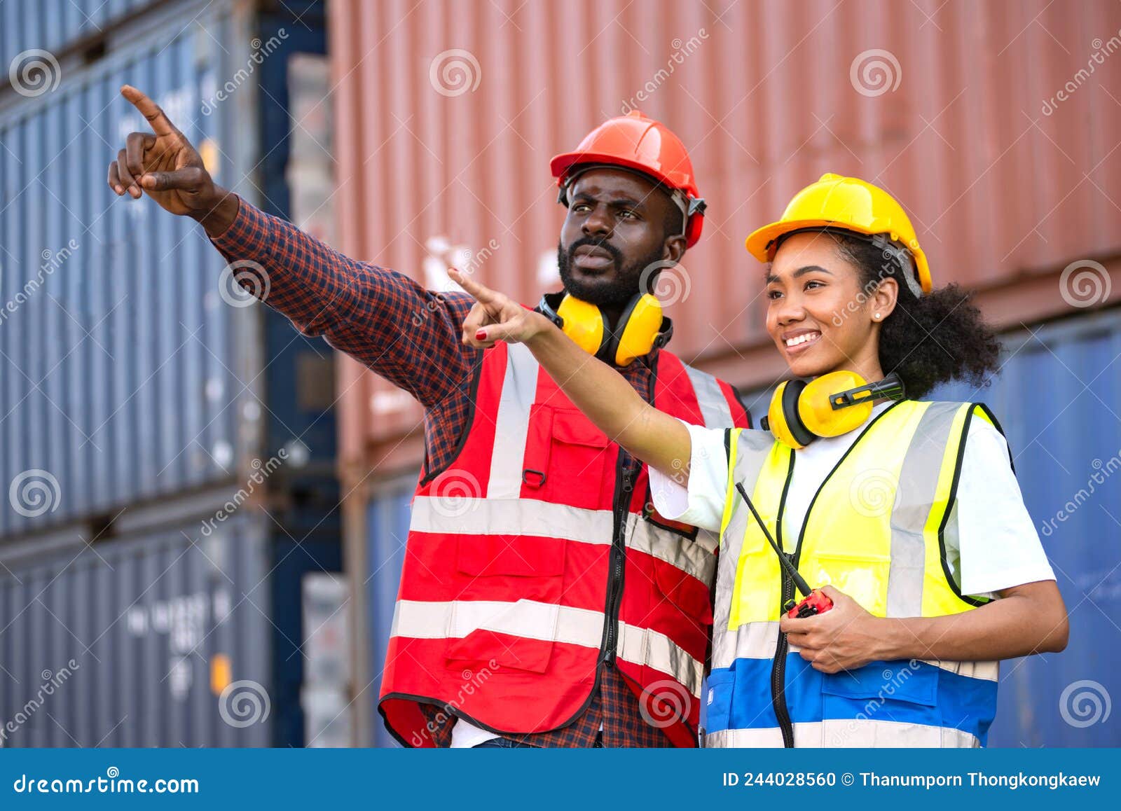 Two African American Male and Female Worker Check and Control Loading ...