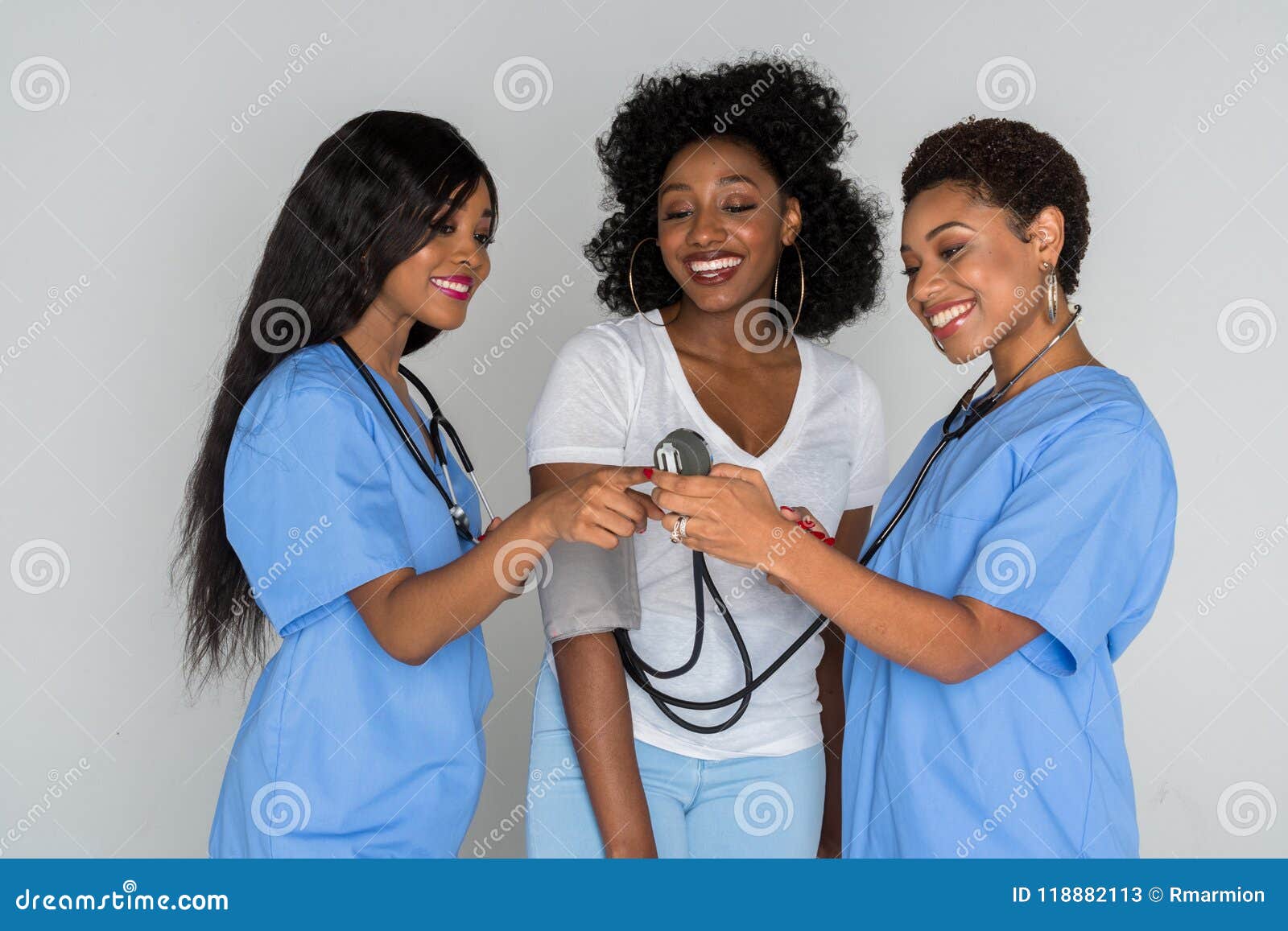 Two Nurses with Patient stock image. Image of medical - 118882113