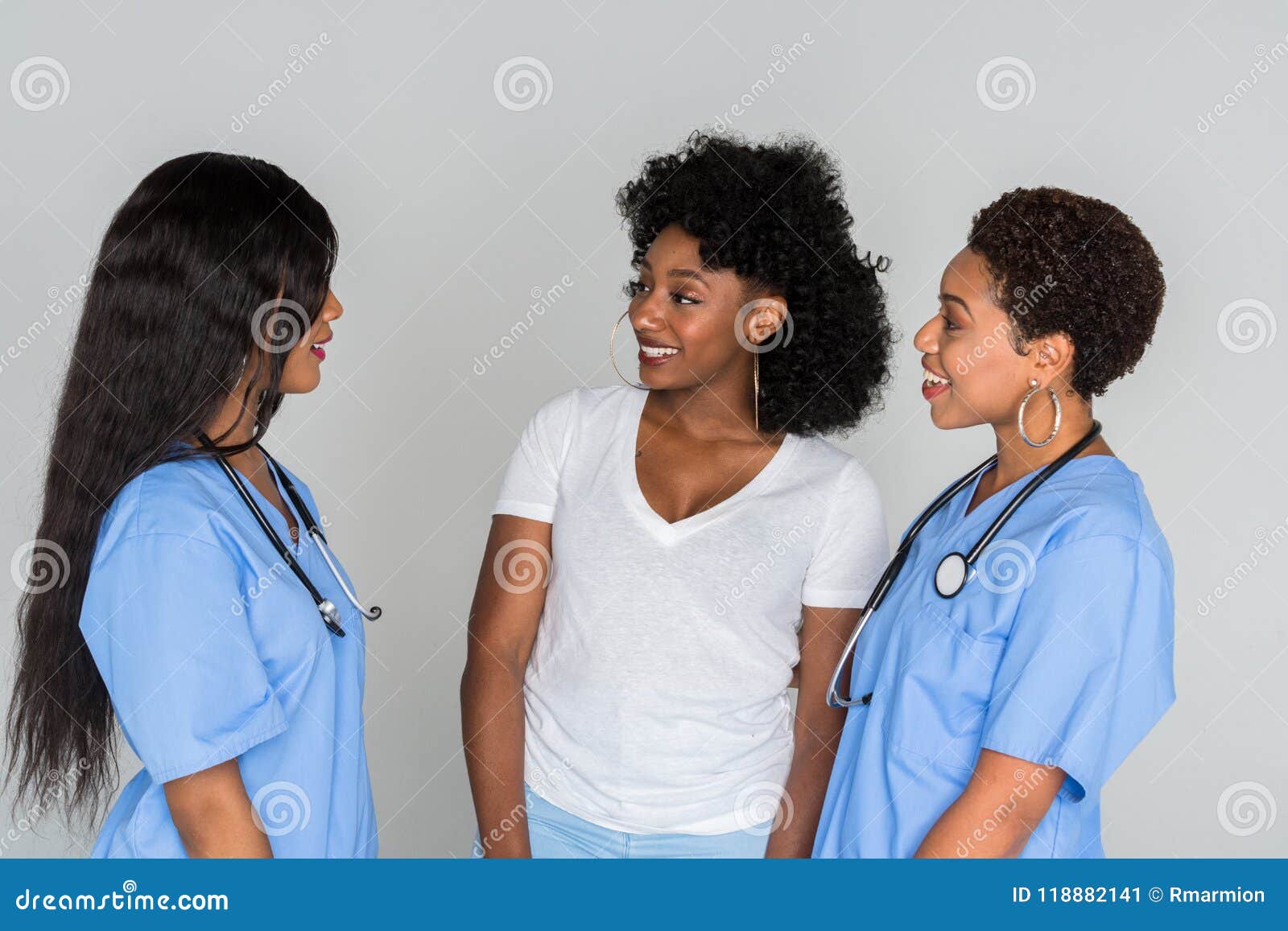 Two Nurses with Patient stock image. Image of women - 118882141