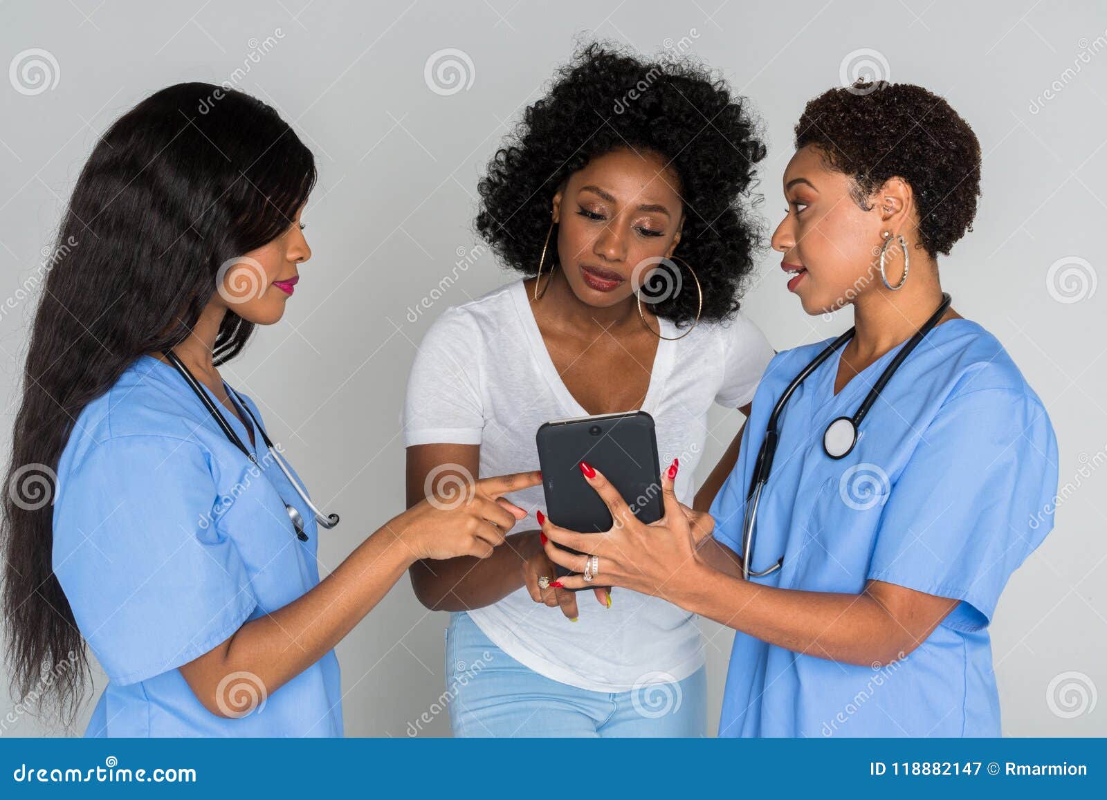 Two Nurses with Patient stock image. Image of sick, medical - 118882147