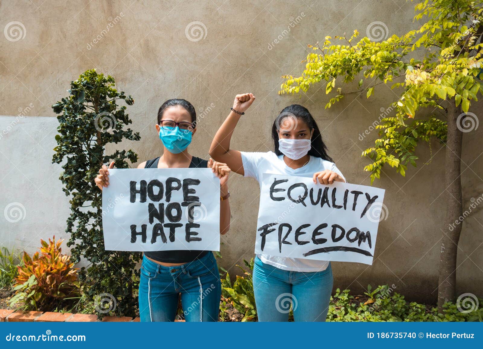 Women Protesting In The Street With Text On Cardboard In French ...