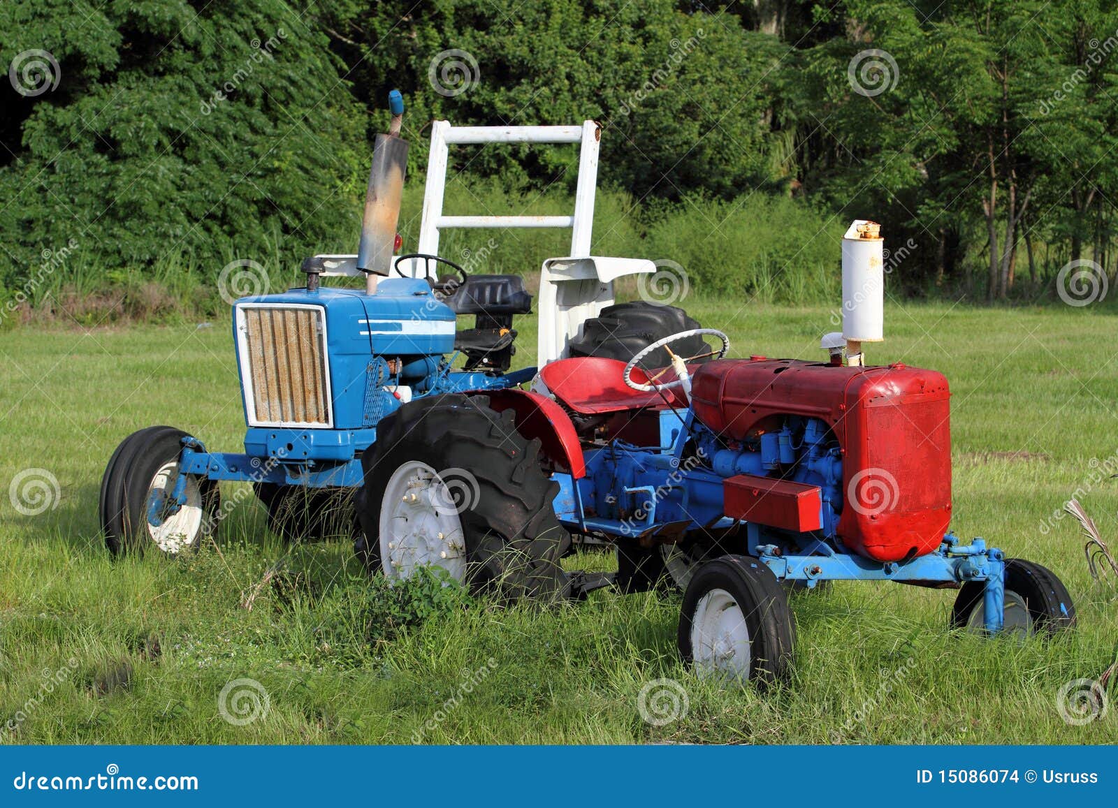 Two agriculture tractors stock photo. Image of machine - 15086074