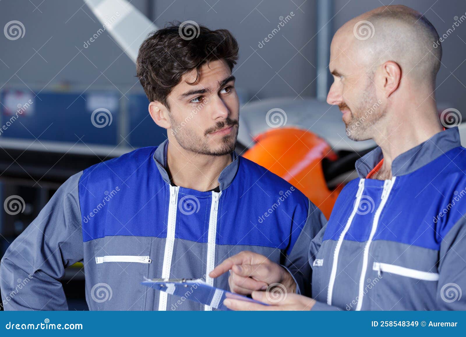 Two Aircraft Mechanics Talking Stock Image - Image of data, tyre: 258548349