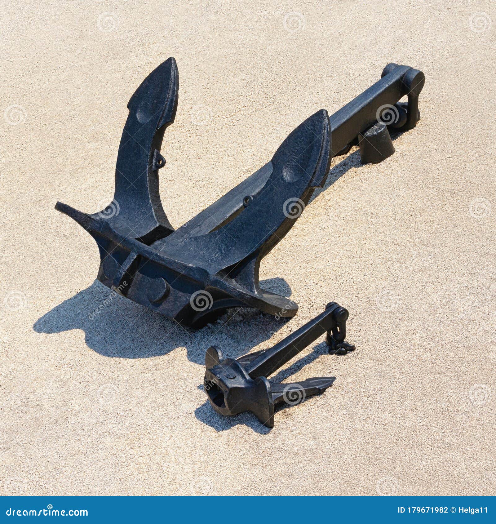 Two Anchors on Sand on Sunny Day Stock Photo - Image of anchors, small ...