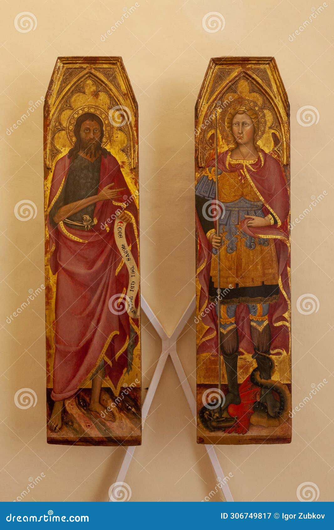 Two Ancient Icons of Catholic Saints Stand Near the Wall Editorial ...