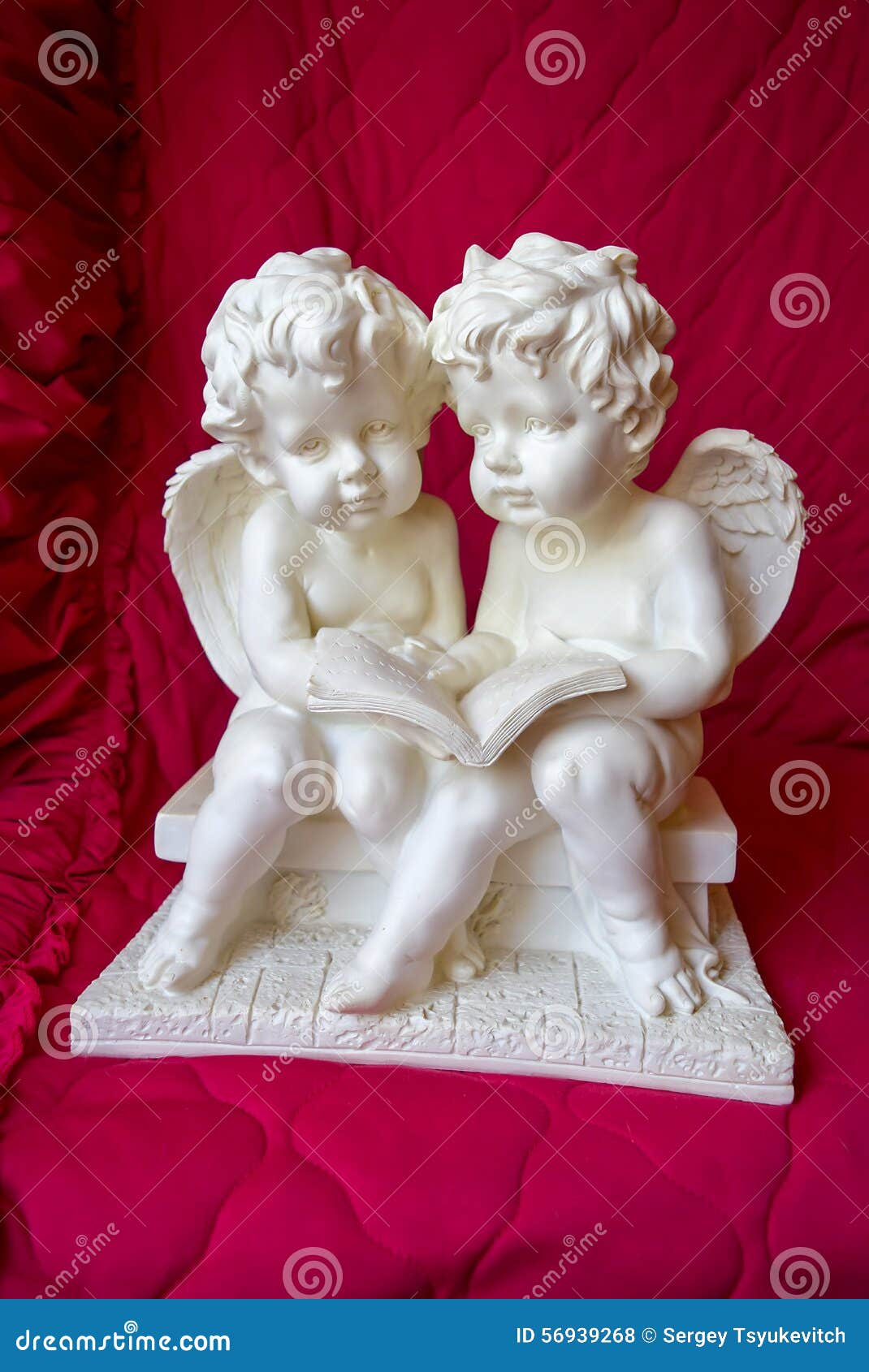 Two angel reading a book stock photo. Image of cute, figurine - 56939268