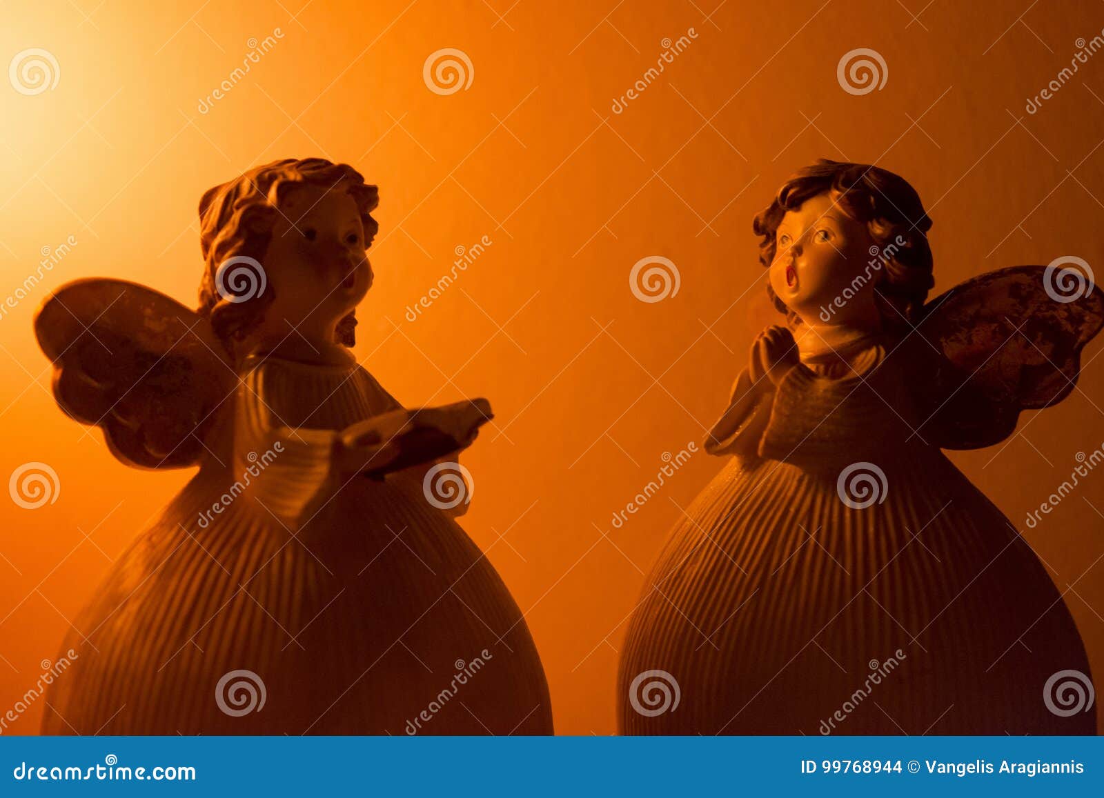 Two Angels Sitting Opposite Stock Photo - Image of christmas, holiday ...