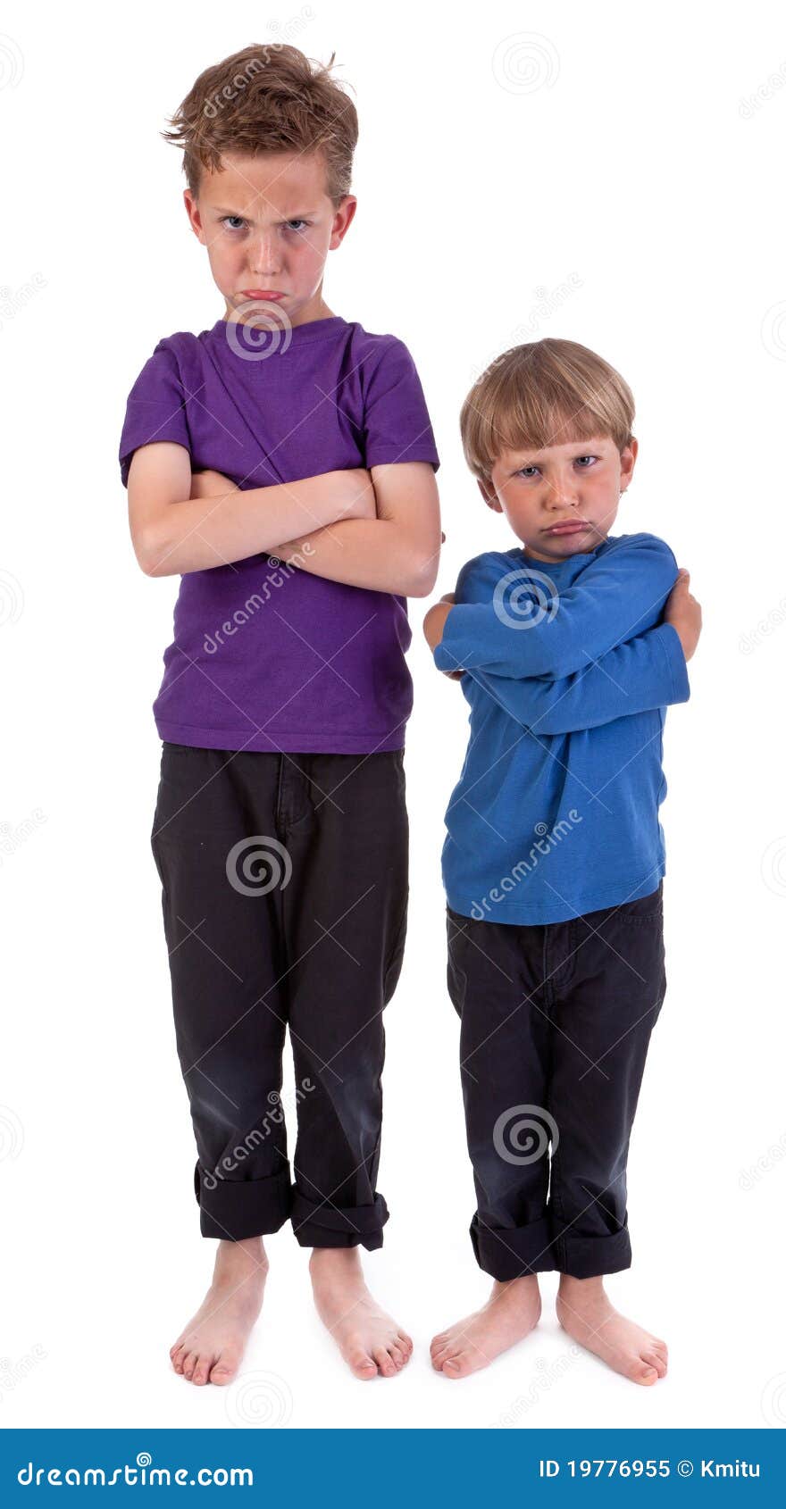 Two Angry Boys Standing Face To Face, Quarreling And Looking At Each ...