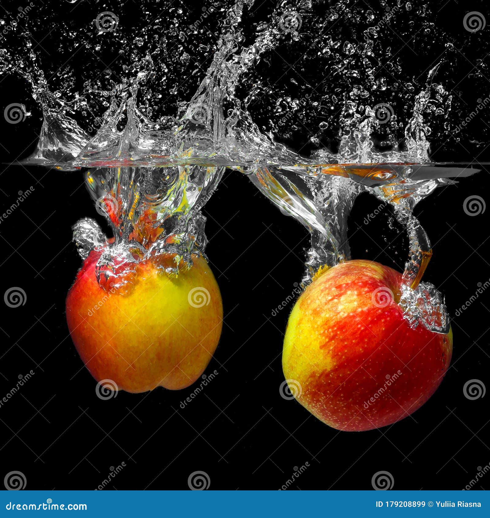 Two Apples in Water on a Black Background.red Apple Dropped into Water ...