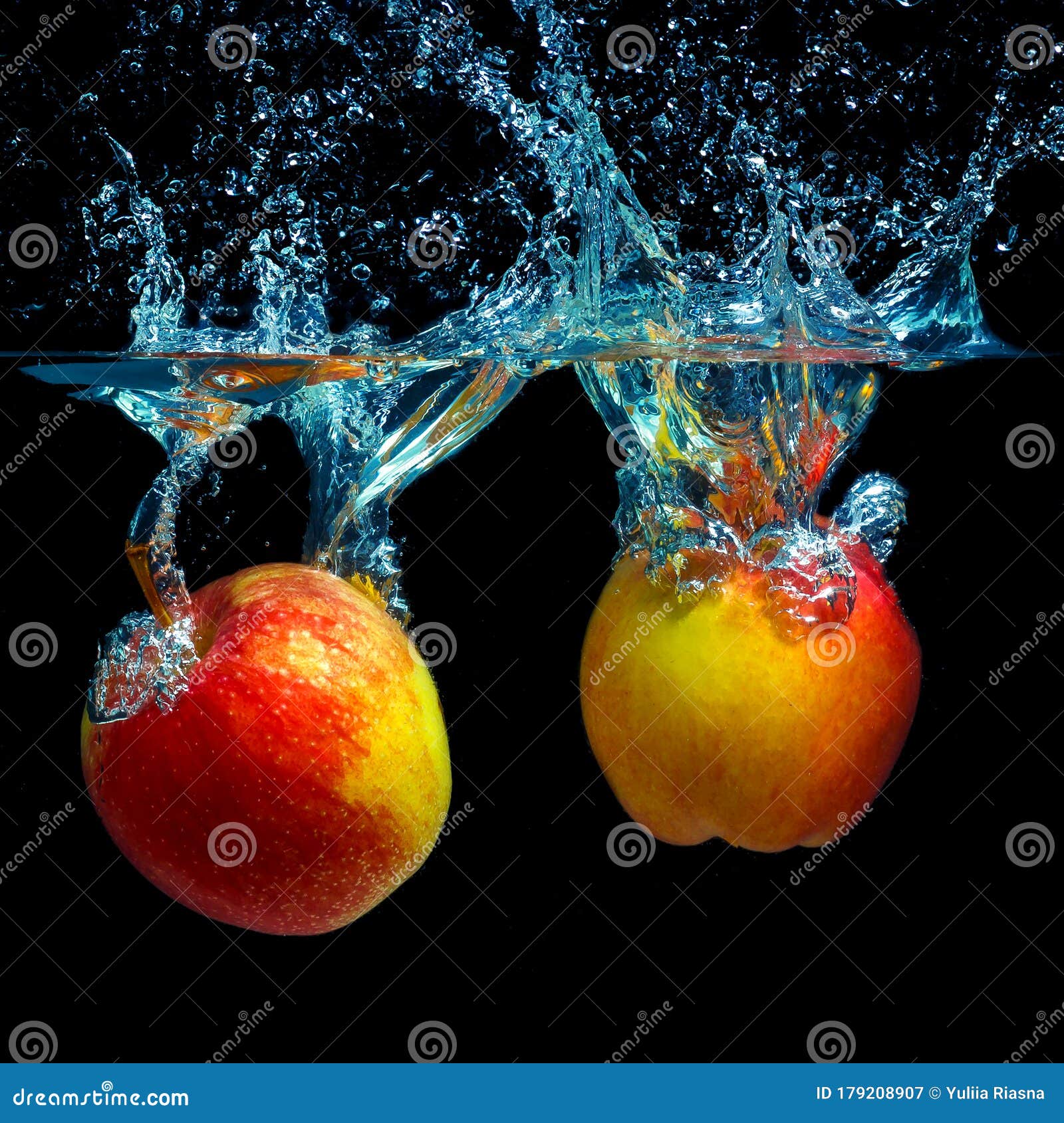 Apple Dropped Into Water Splash On White Royalty-Free Stock Photo ...