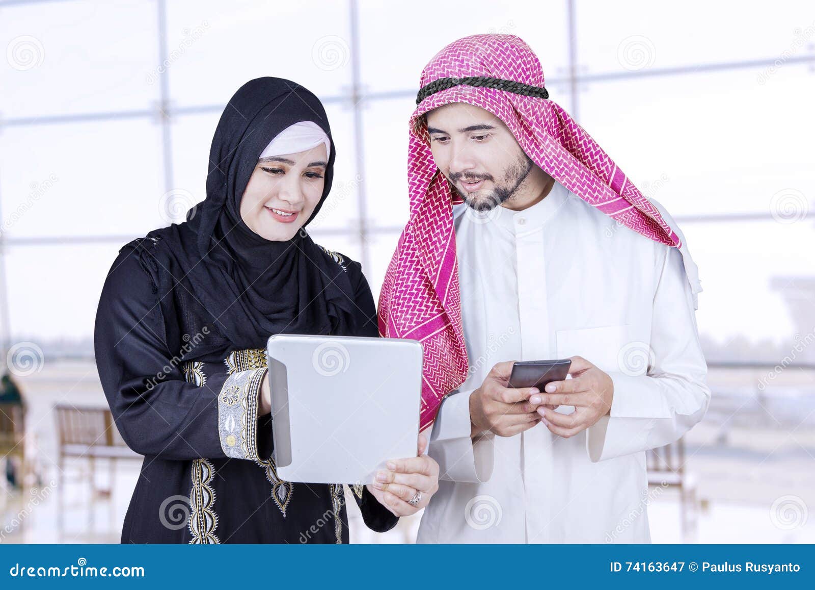 Two Arab Workers Using Tablet Stock Image - Image of group, businessman ...