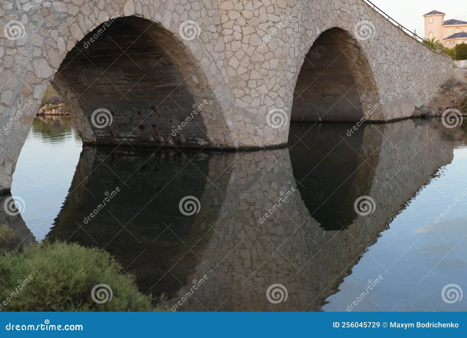 Two-arch Bridge Over the River with Reflection in the Water I Stock ...