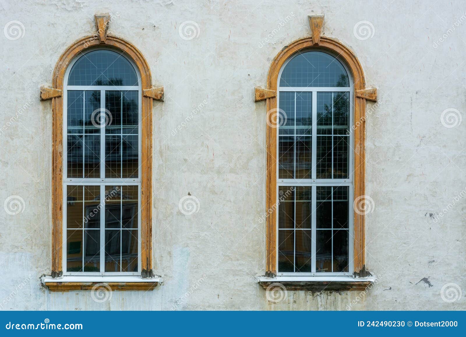 Two arched windows stock photo. Image of line, outdoor - 242490230
