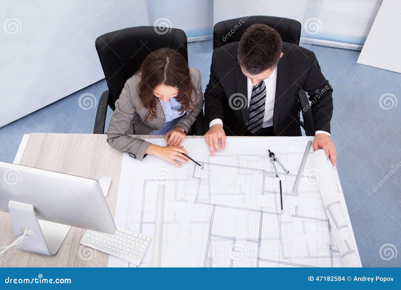 Two architect discussing stock photo. Image of brunette - 47182584