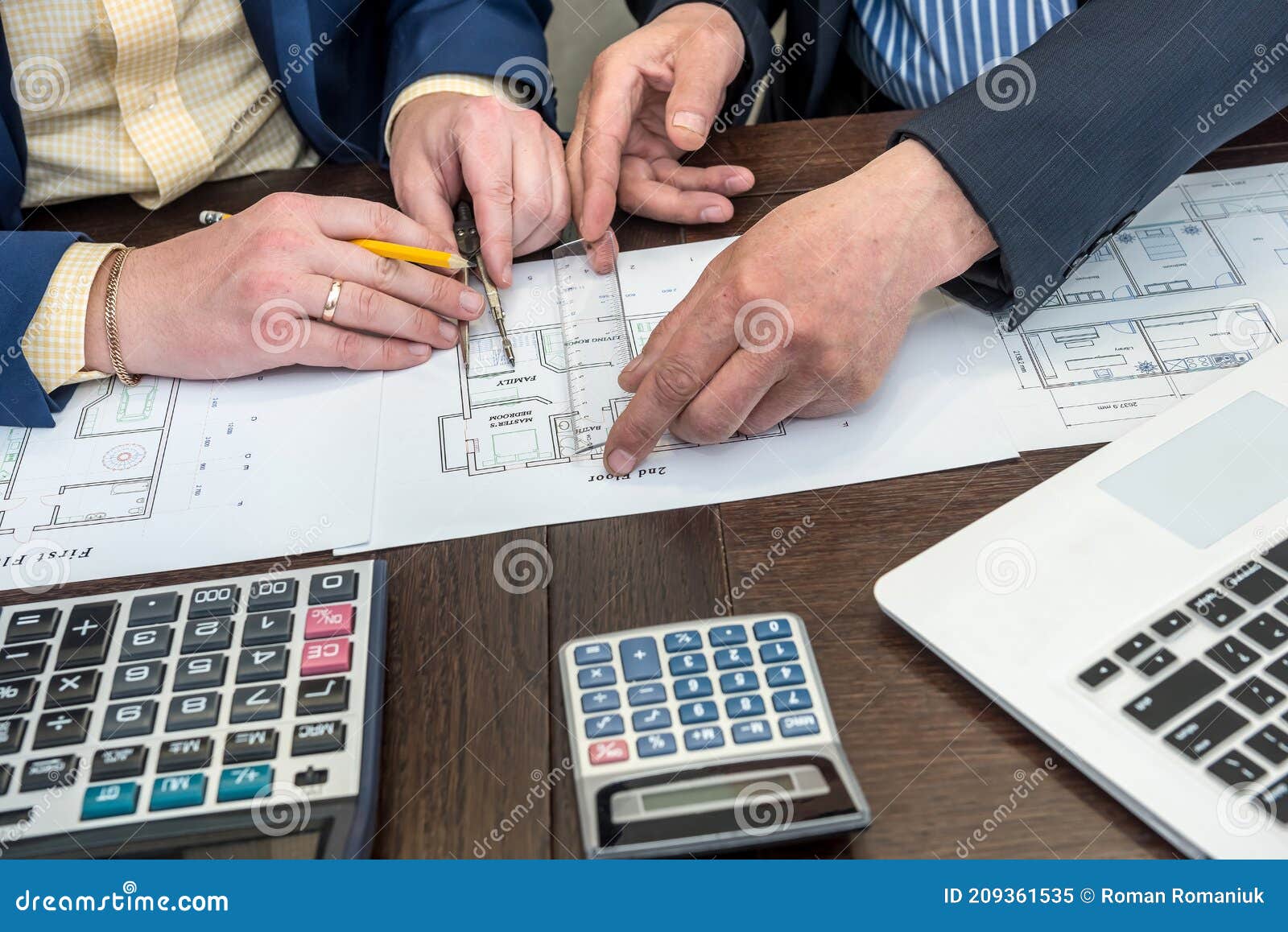 Two Architect Partners Working at Houme Draw Construction with Laptop ...