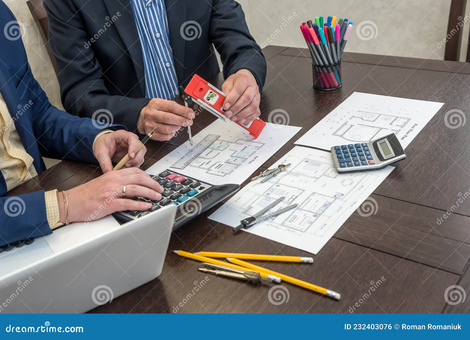 Two Architect Partners Working at Houme Draw Construction with Laptop ...