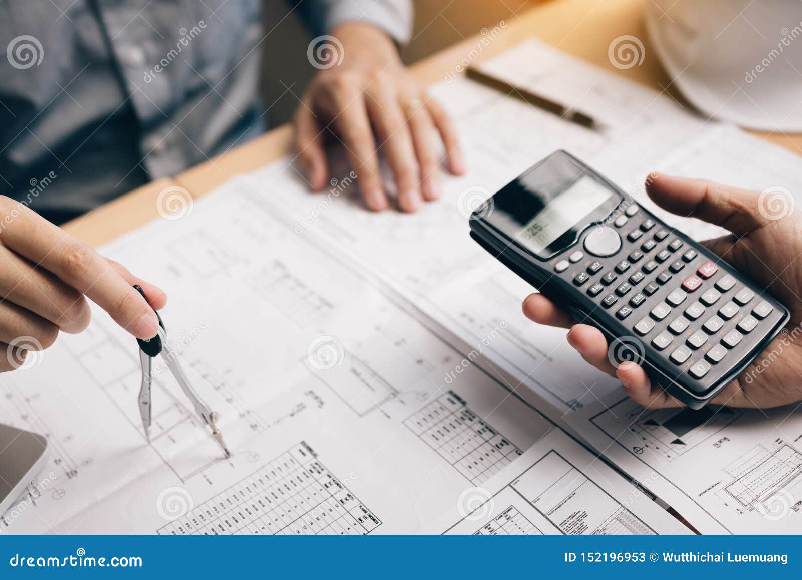 Two Architect Working At Construction Site And Compass Drawing Pointing ...