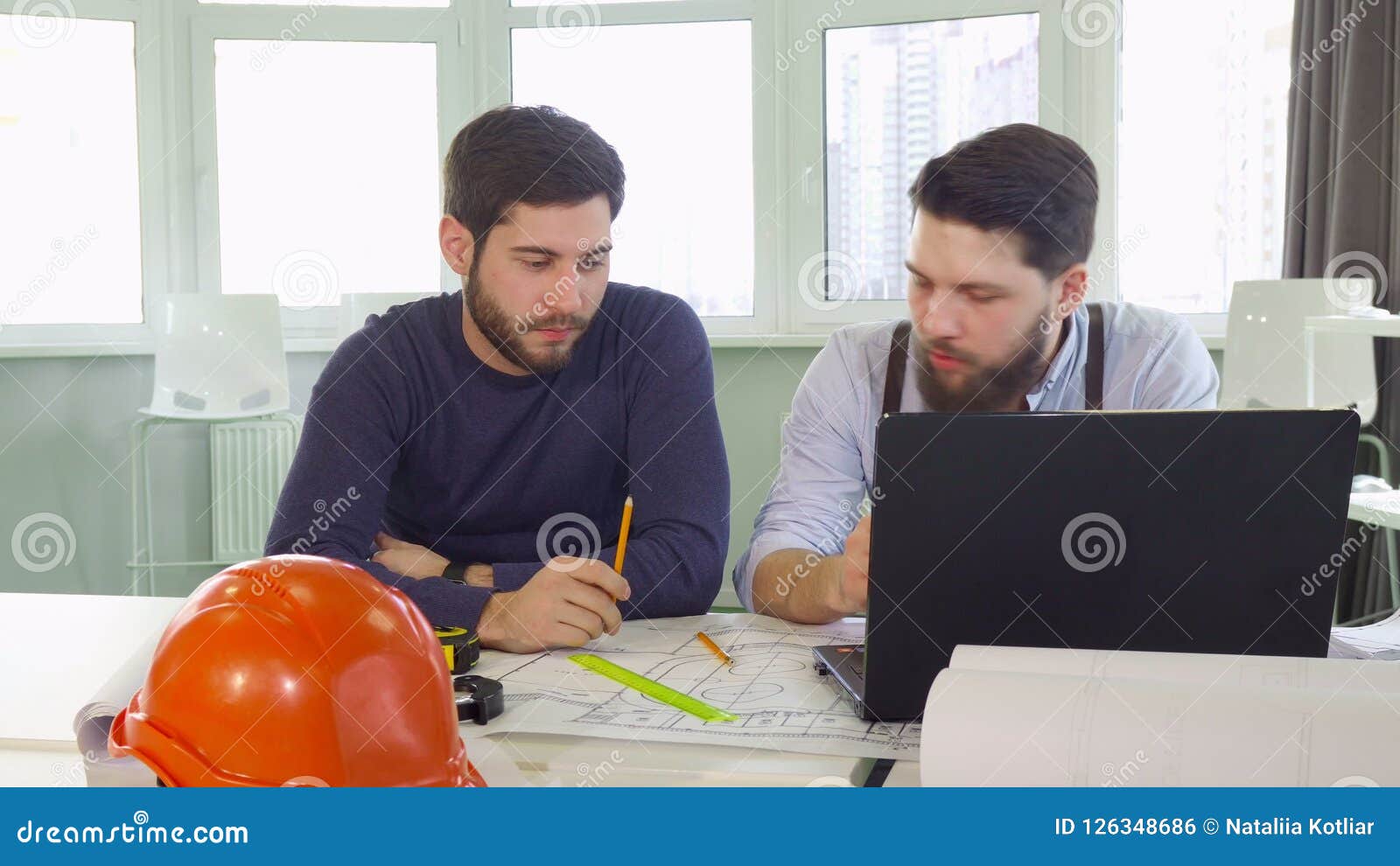 Two Architects Gesture at the Table Stock Photo - Image of development ...