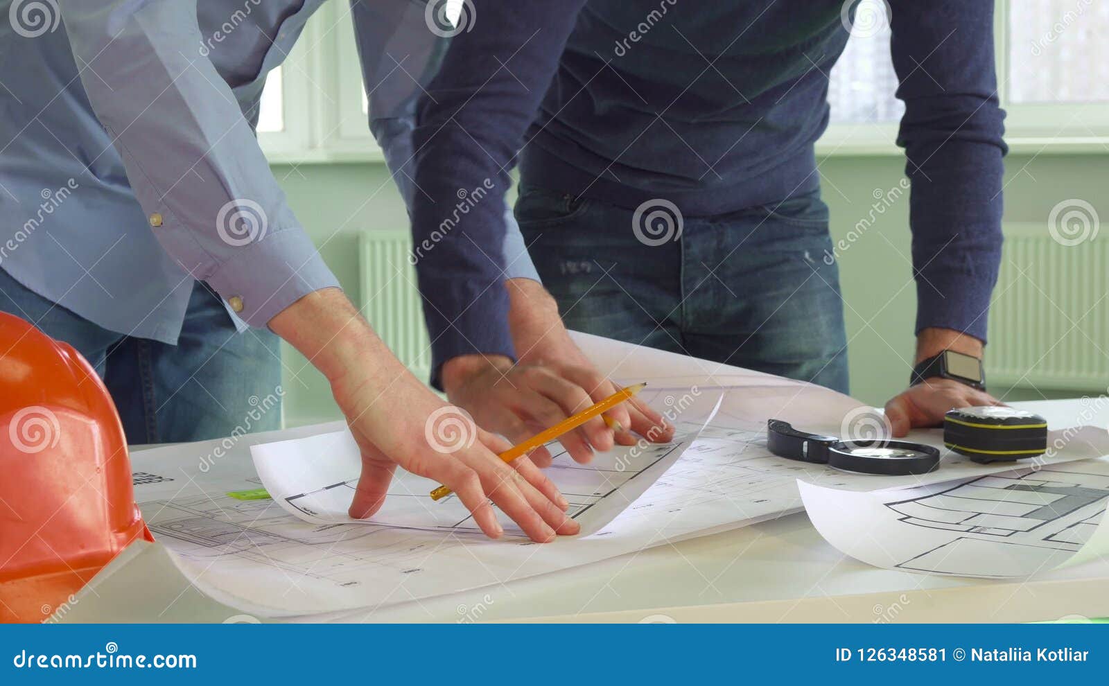 Two Architects Make Marks on the Plans of the Building Stock Image ...
