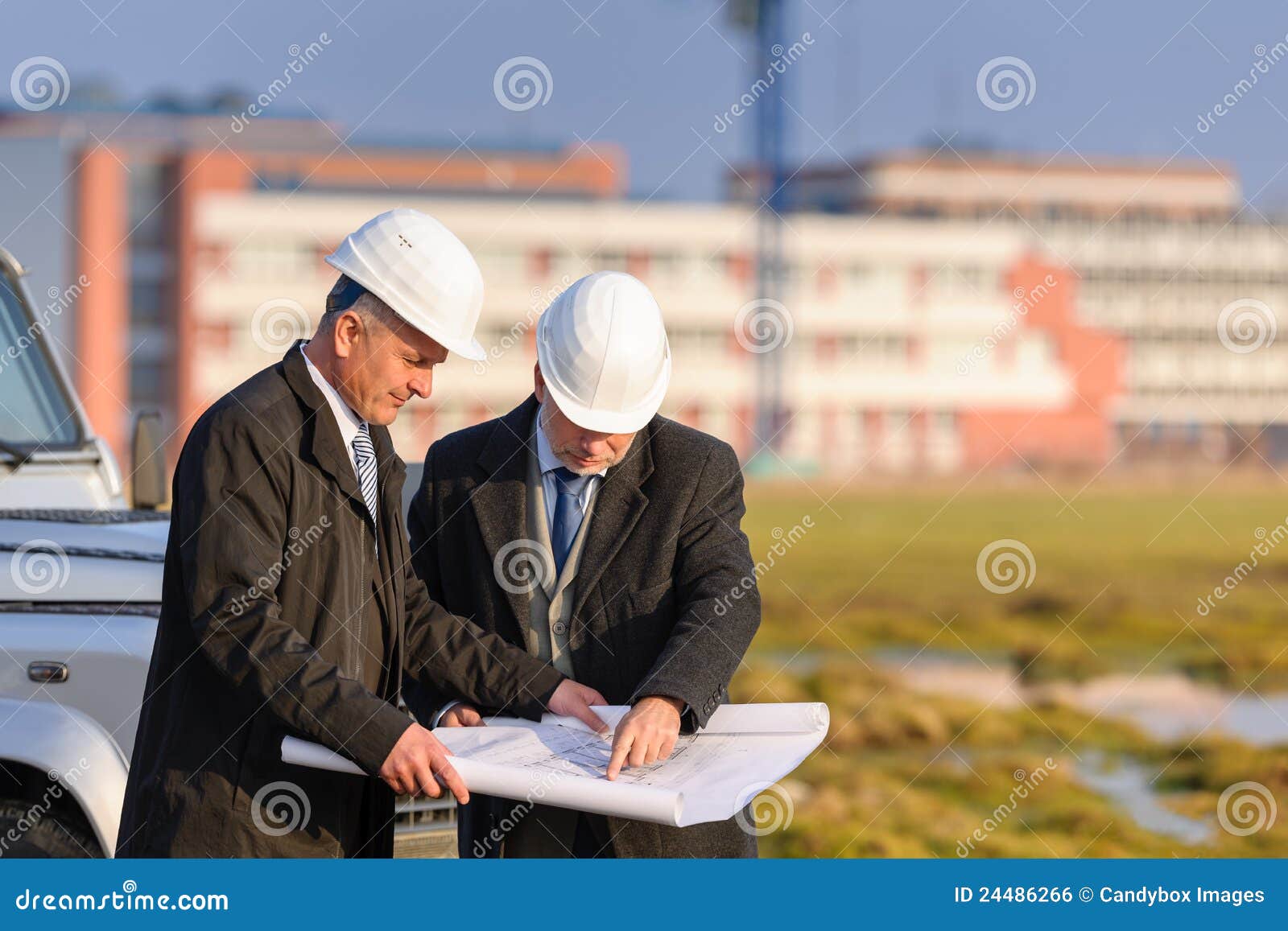Two Architects Man Look at Construction Plan Stock Photo - Image of ...