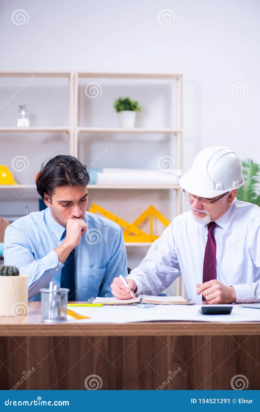 Two Architects Working on the Project Stock Image - Image of blue ...