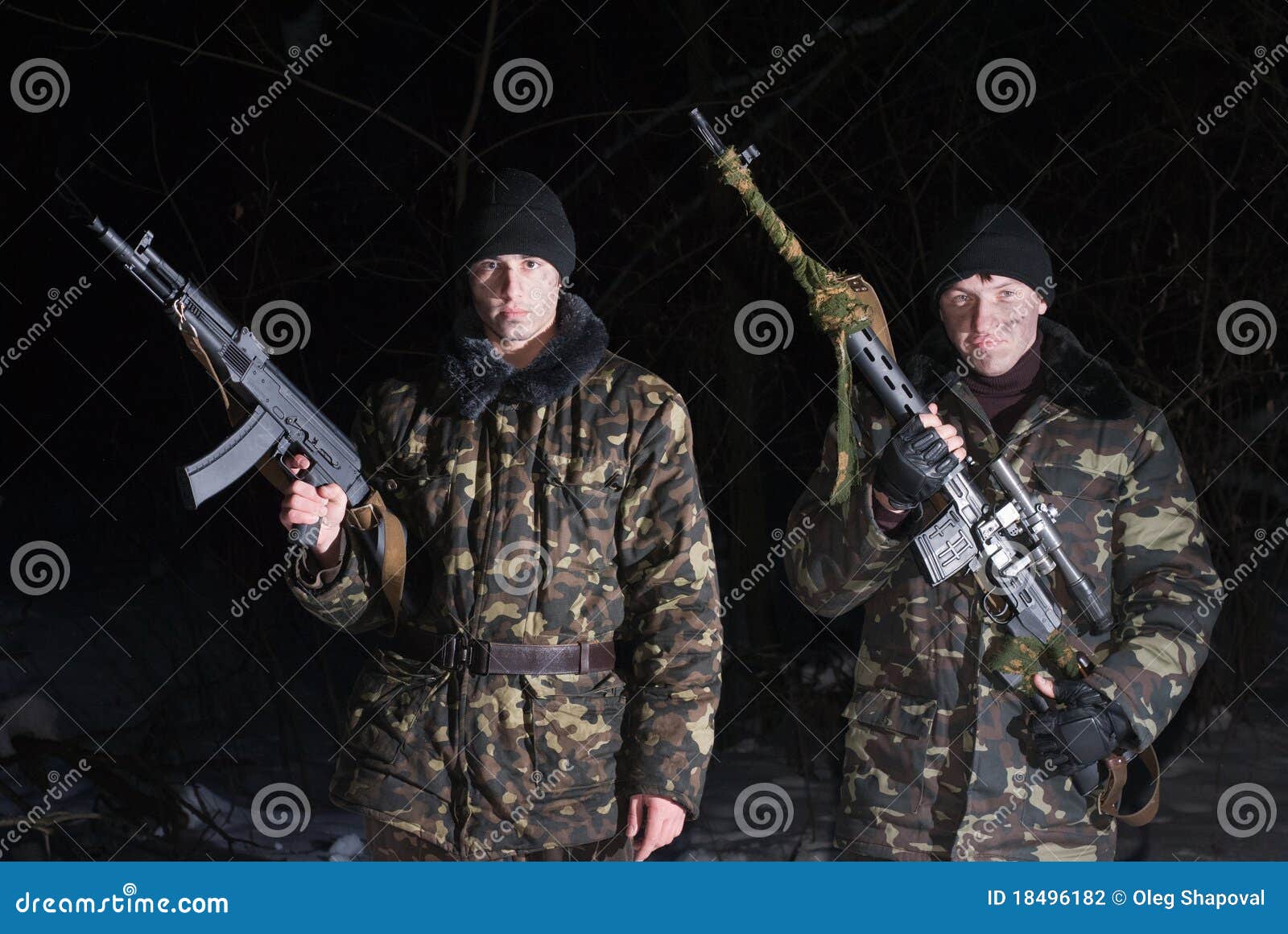 Two armed military men. stock photo. Image of person - 18496182