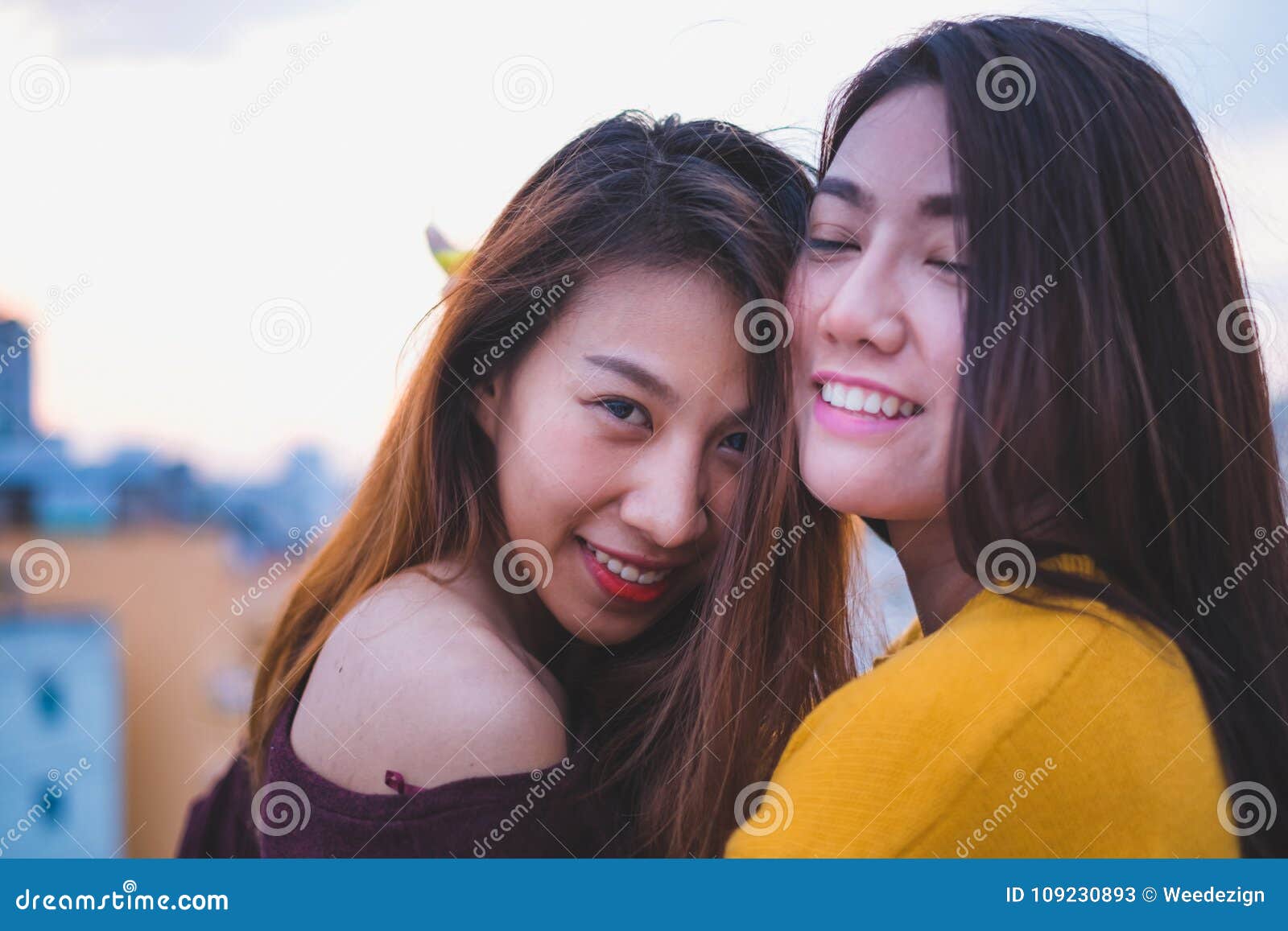 Two Asia Lesbian Lgbt Couple At Roof Top Party In Sunset Evening Stock