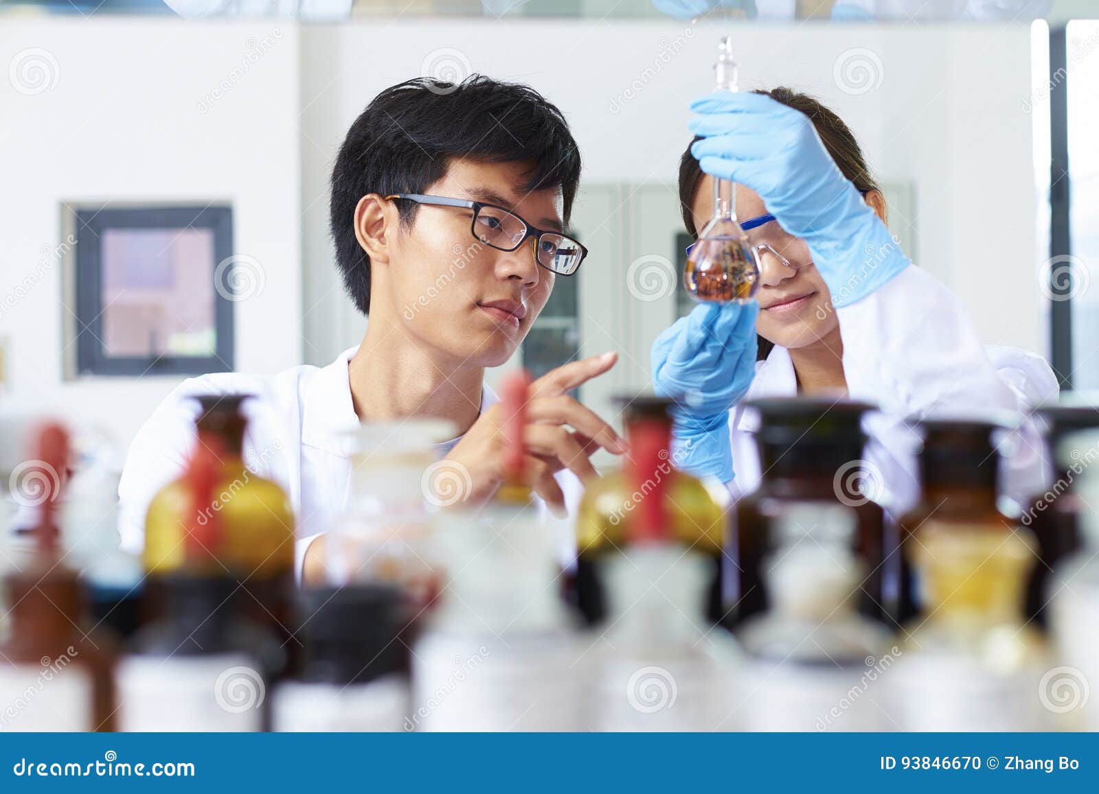 Two Asian Laboratory Scientist Working at Lab with Test Tubes Stock ...