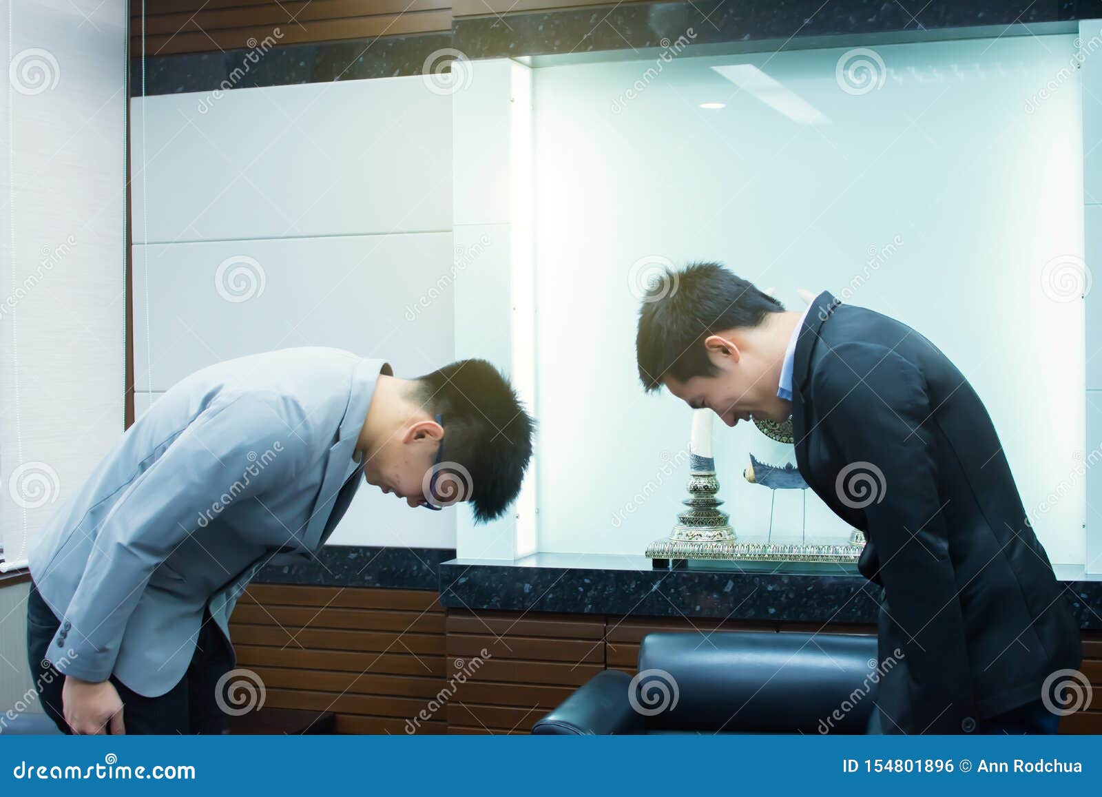 Two Business Bowing Each Others for Business Manner Stock Photo - Image ...