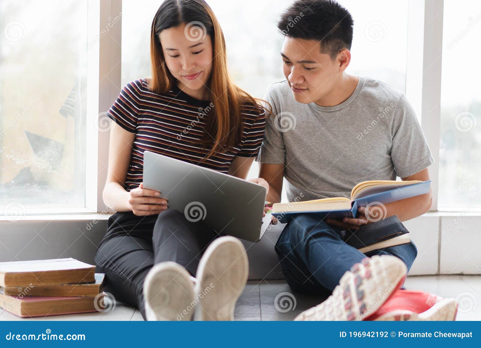 Two Asian Students are Researching for Project in Library Stock Photo ...