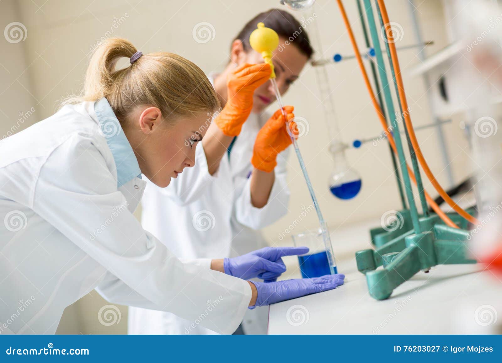 Two Assistant in Lab Take Liquid with Big Pipette Stock Image - Image ...