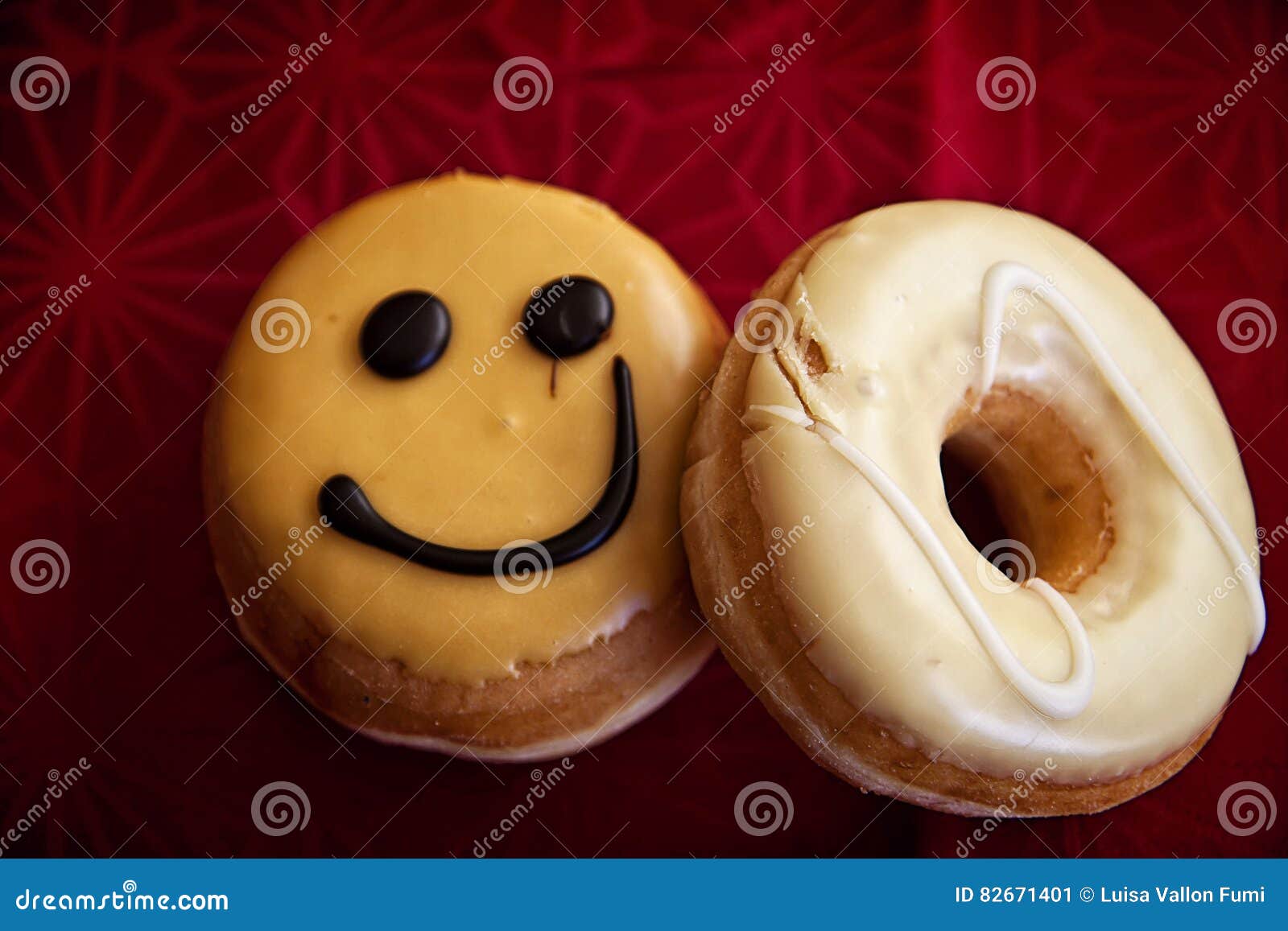Two assorted doughnuts stock image. Image of frosting - 82671401
