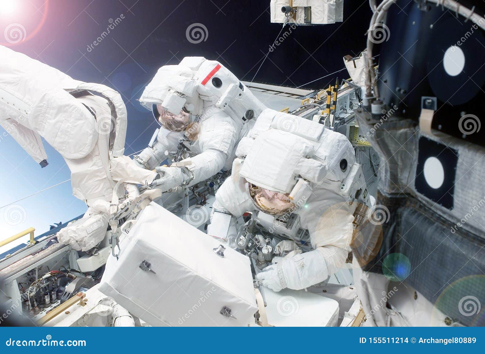 Two Astronauts are Engaged in Experiences and Repair at the Space ...