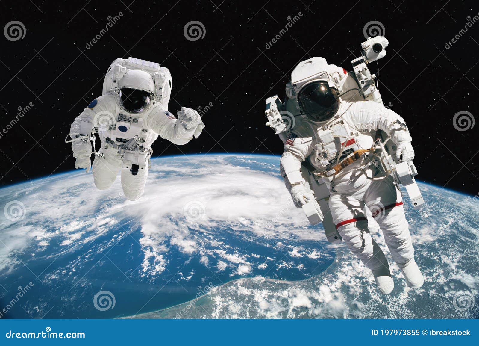 Two Astronauts Walking in Space with Earth Background. Elements of this ...