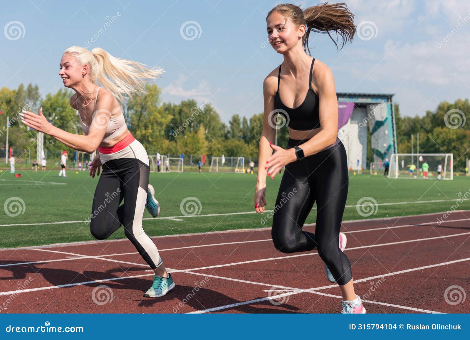 Two Athlete Young Woman Runnner at the Stadium Stock Photo - Image of ...